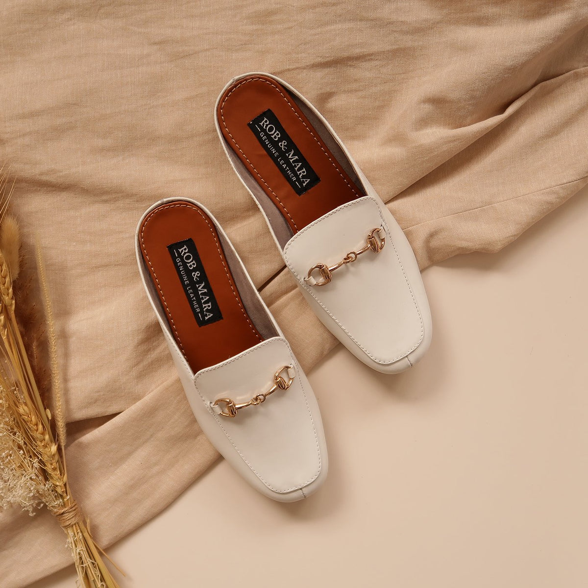 Celeste in Ivory Mules Rob and Mara